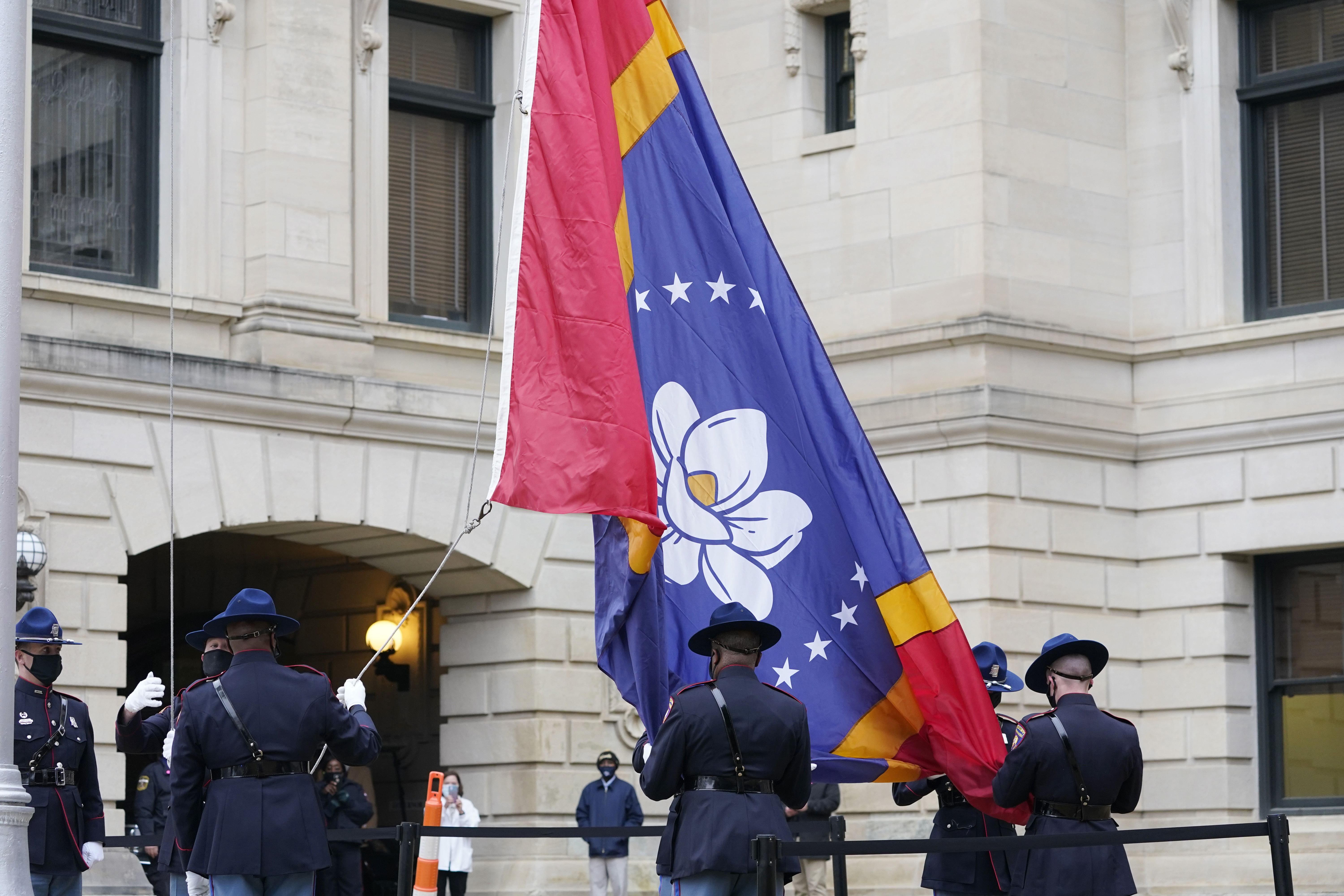 Gov. signs bill officially adopting new state flag